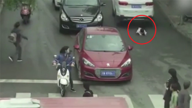 Toddler in China survives being run over by two SUVs